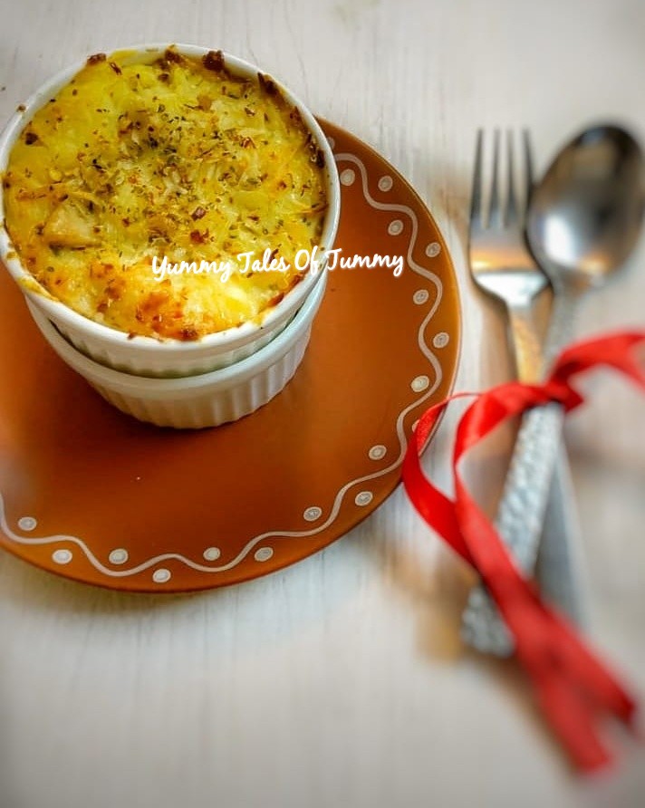 Potato Bake | Creamy Cheesy potato bake - Yummy tales of tummy